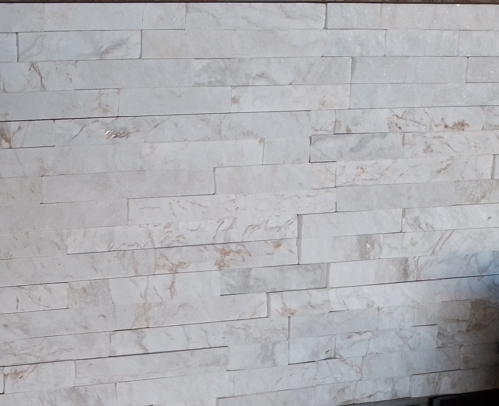 Assembled natural stone panels